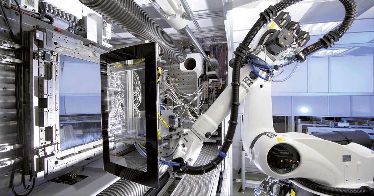 Injection molding polycarbonate automotive glazing - ENGEL