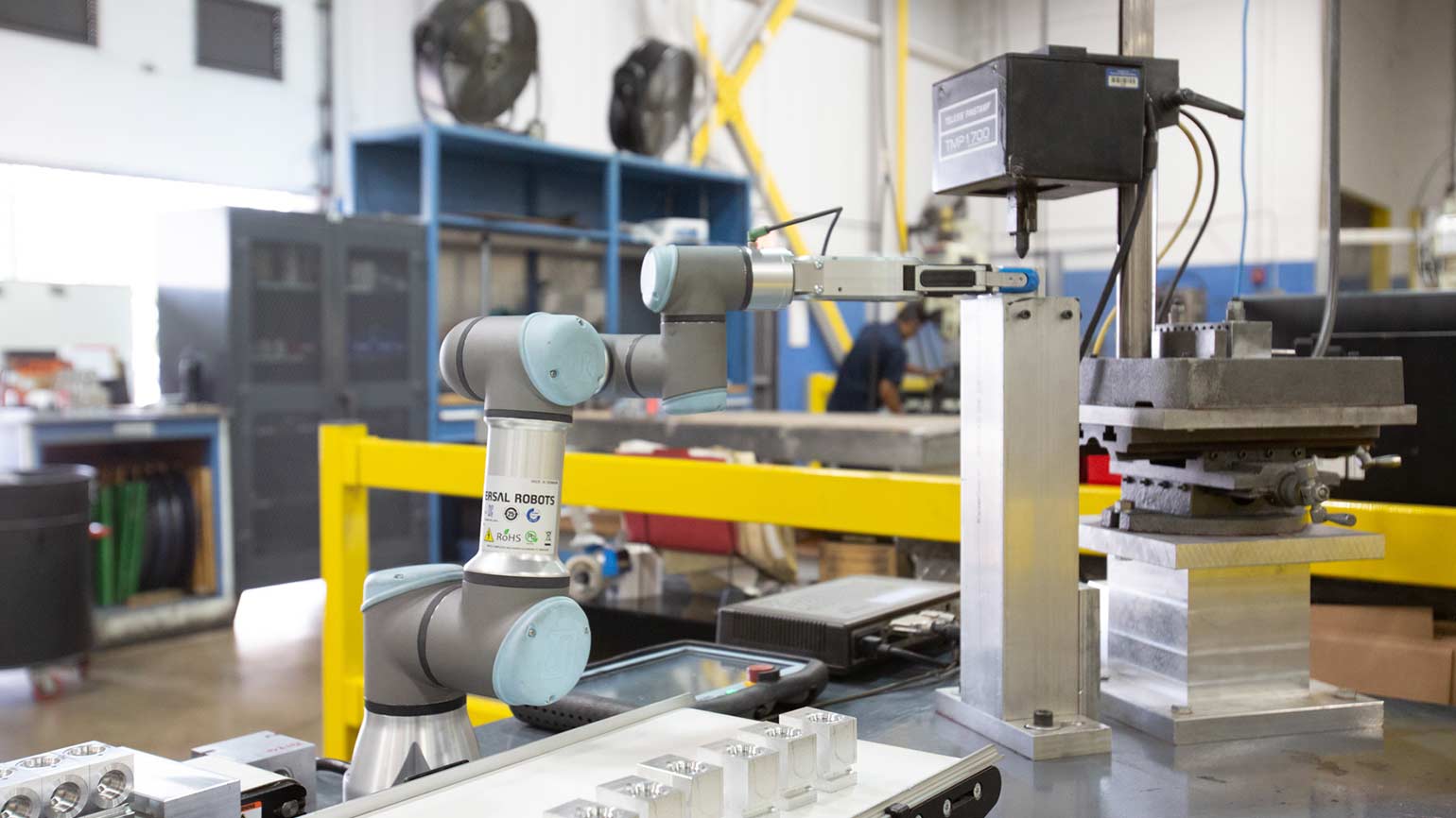 Pin stamping process automated | Tomenson Machine Works Inc