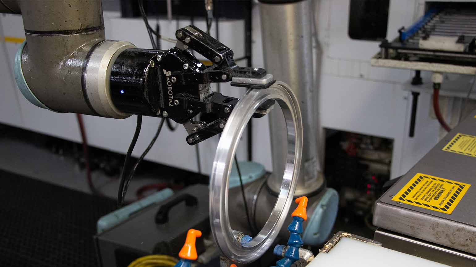 Dual-spindle CNC tending | UR10e at RCM | Cobot Case Stories