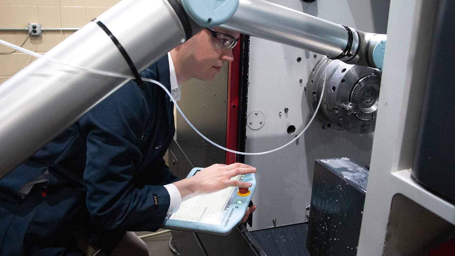 Dual-spindle CNC tending | UR10e at RCM | Cobot Case Stories