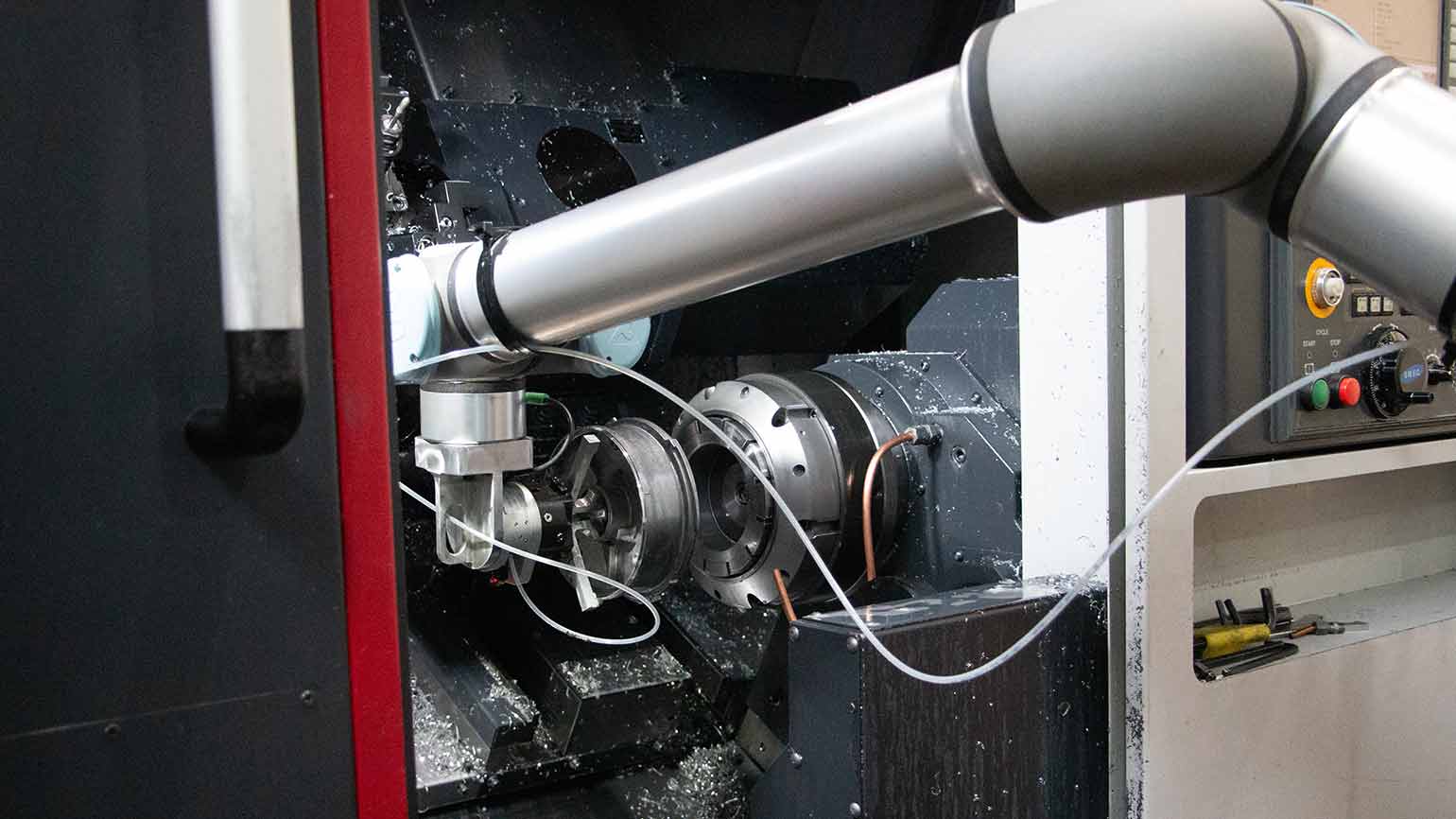 Dual-spindle CNC tending | UR10e at RCM | Cobot Case Stories