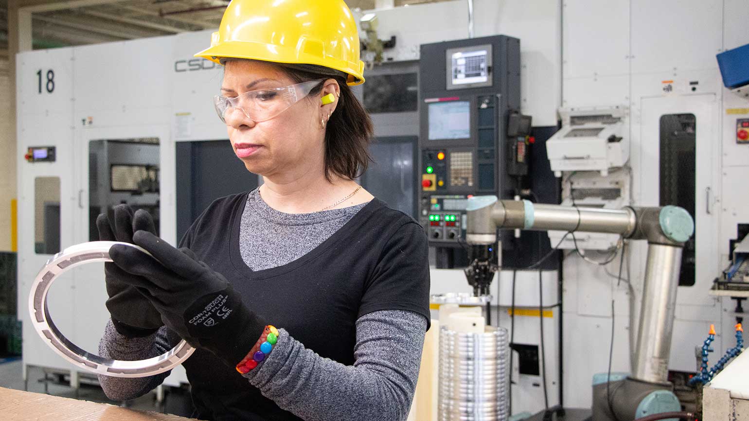 Dual-spindle CNC tending | UR10e at RCM | Cobot Case Stories