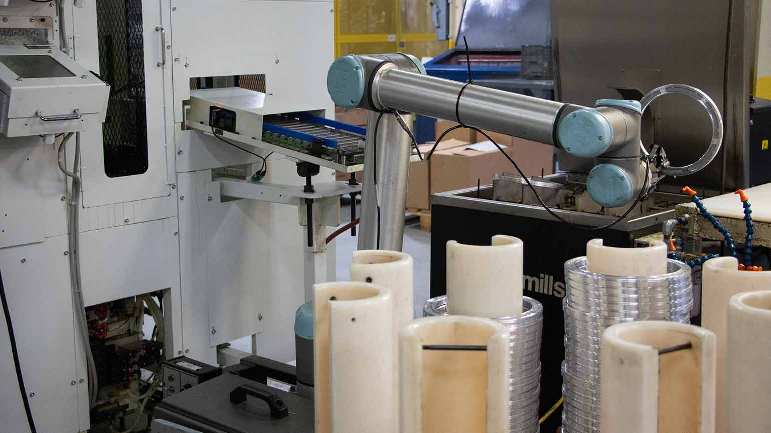 Dual-spindle CNC tending | UR10e at RCM | Cobot Case Stories