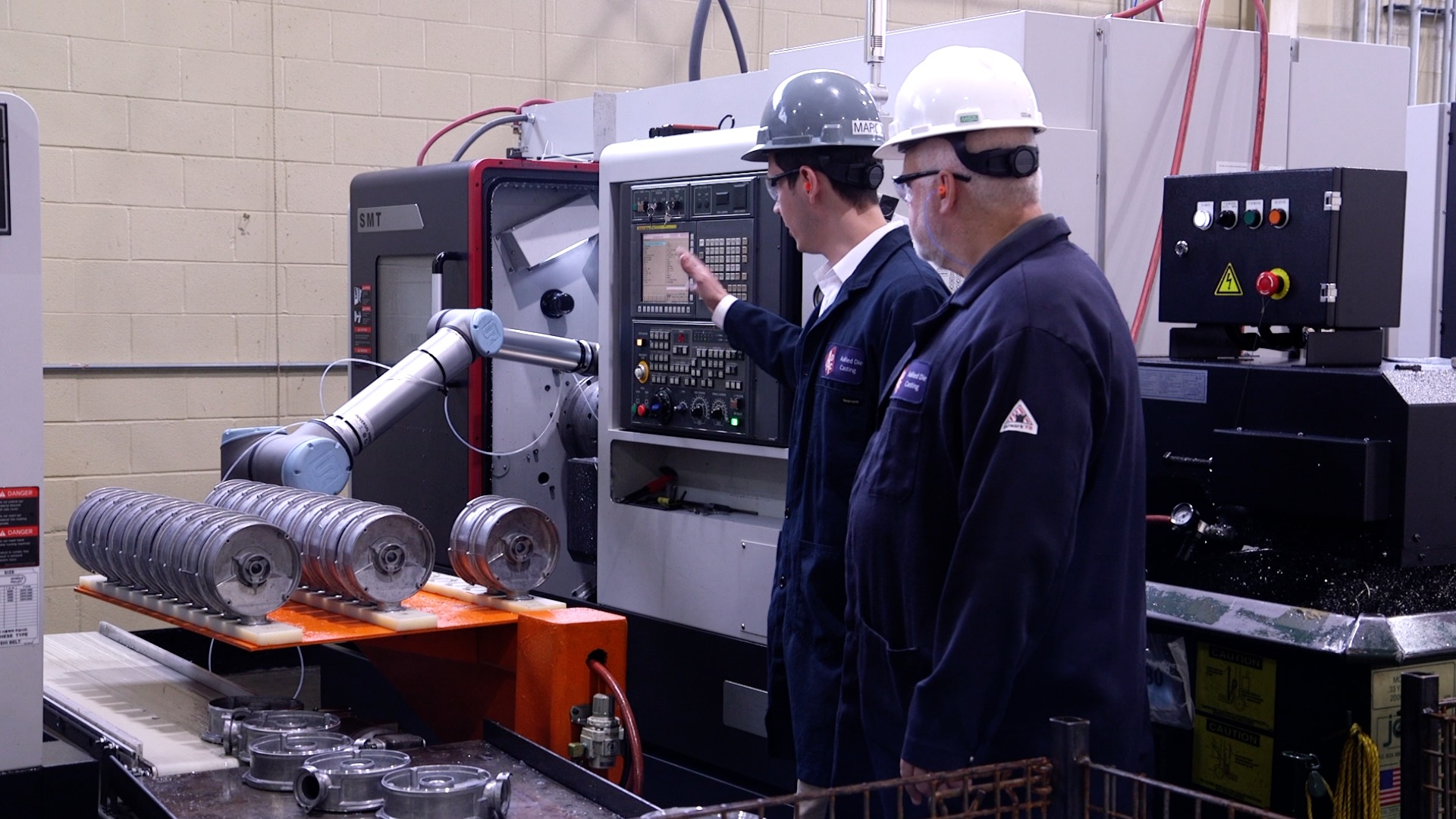 Dual-spindle CNC tending | UR10e at RCM | Cobot Case Stories