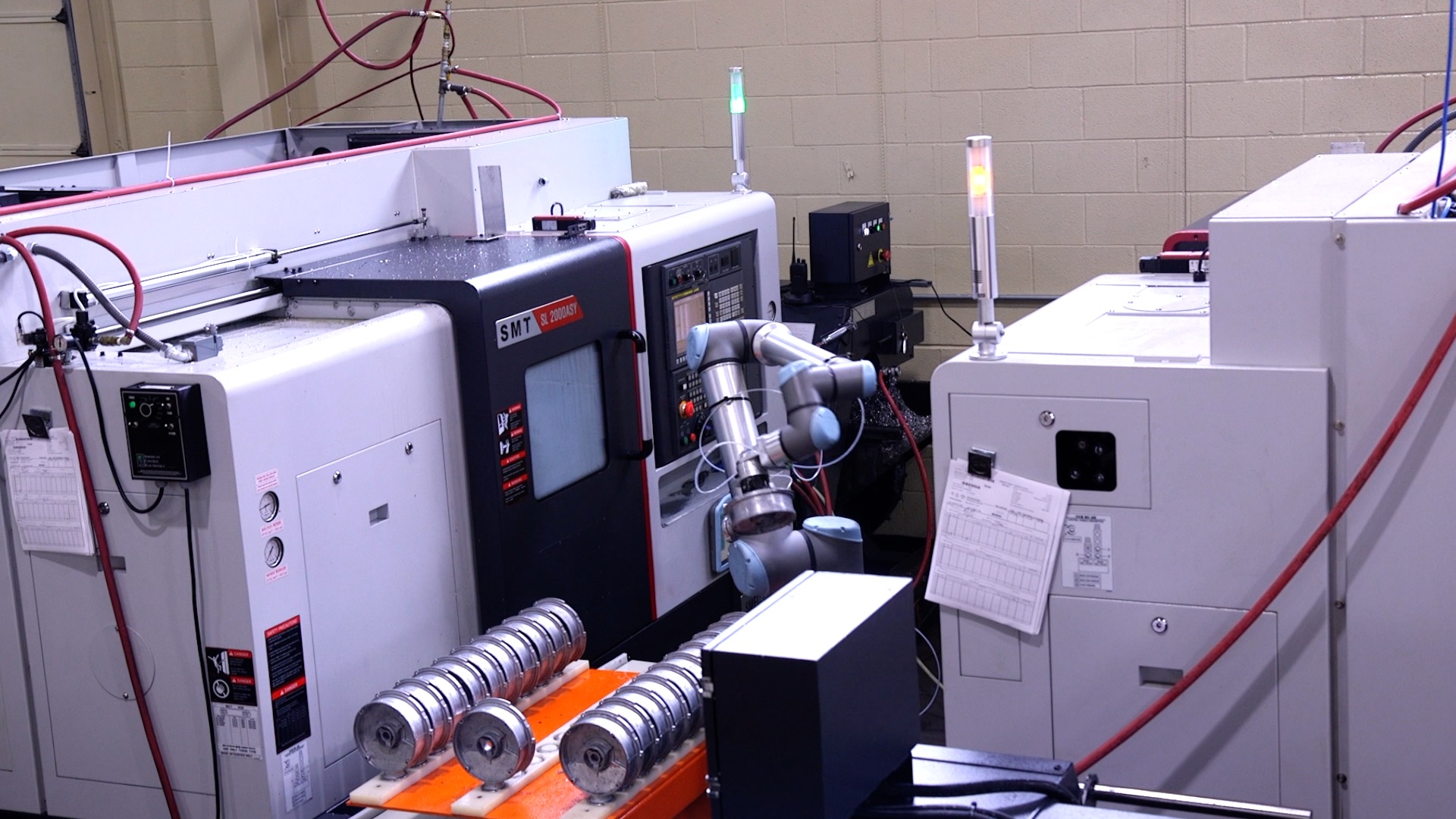 Dual-spindle CNC tending | UR10e at RCM | Cobot Case Stories