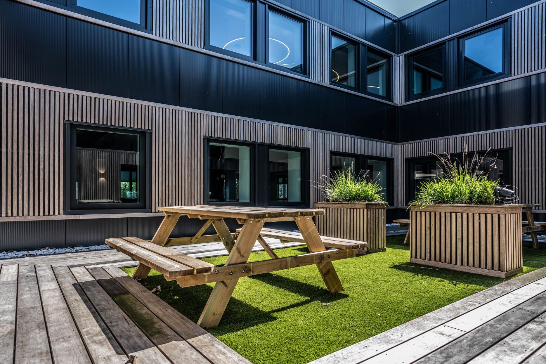 Coloured pop rivets and screws for CNSTRCT office building