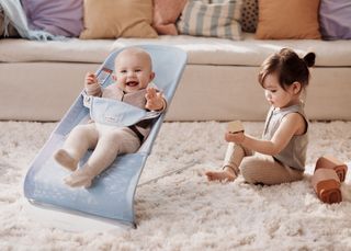 What’s the difference between a baby swing and a baby bouncer?