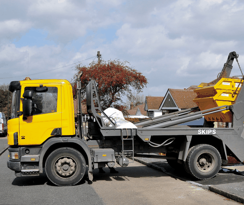Can a Skip be Lifted over a Wall or Fence? | Skip Hire Guide | JustHire