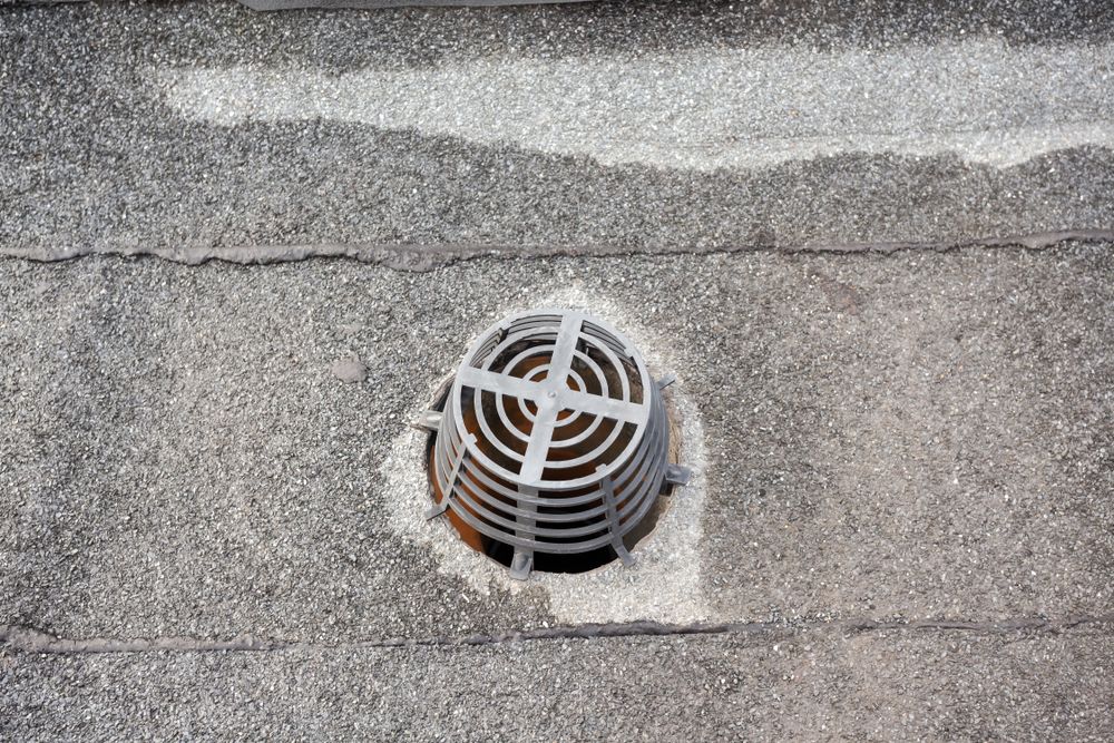 Flat roof drainage solutions | Prevent ponding & water damage ...