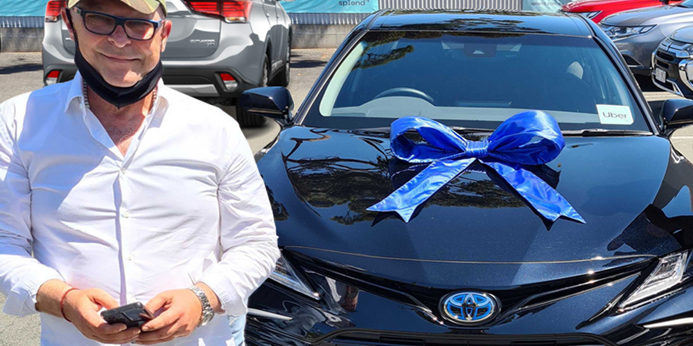 Dragan is ready to thrive with his new Toyota Camry Hybrid