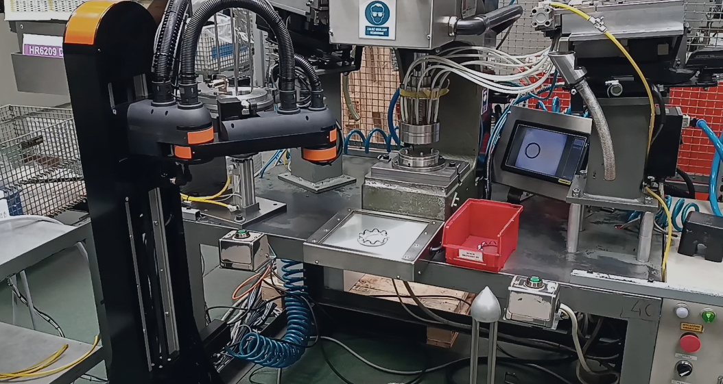 Automated ring insert and quality control with SCARA robot