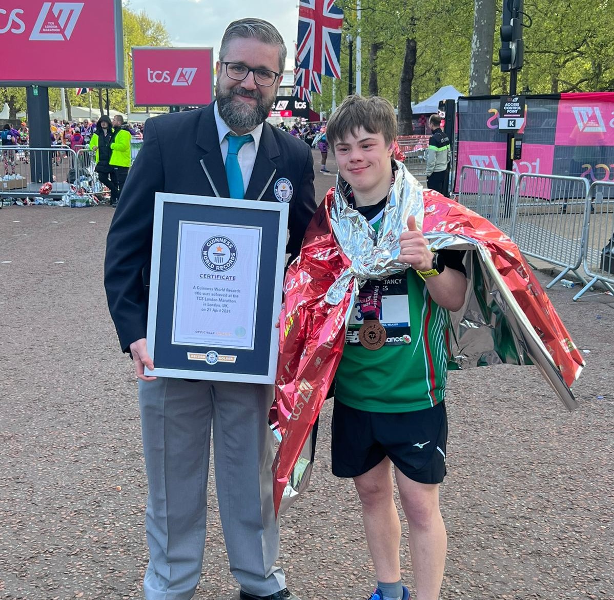 Lloyd Martin becomes youngest runner with Down Syndrome to complete the London Marathon